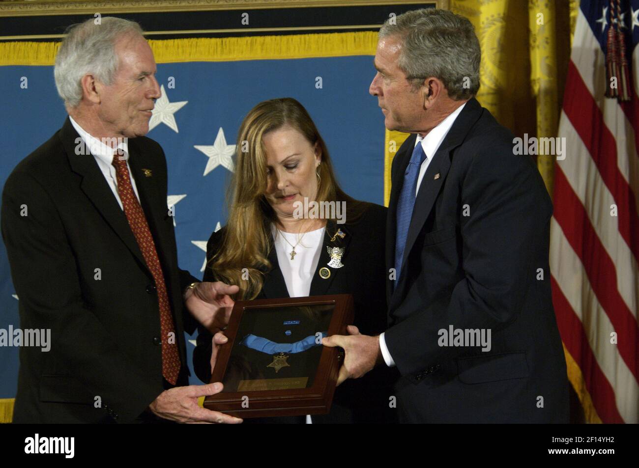 President George W. Bush presents the Medal of Honor to Daniel and ...