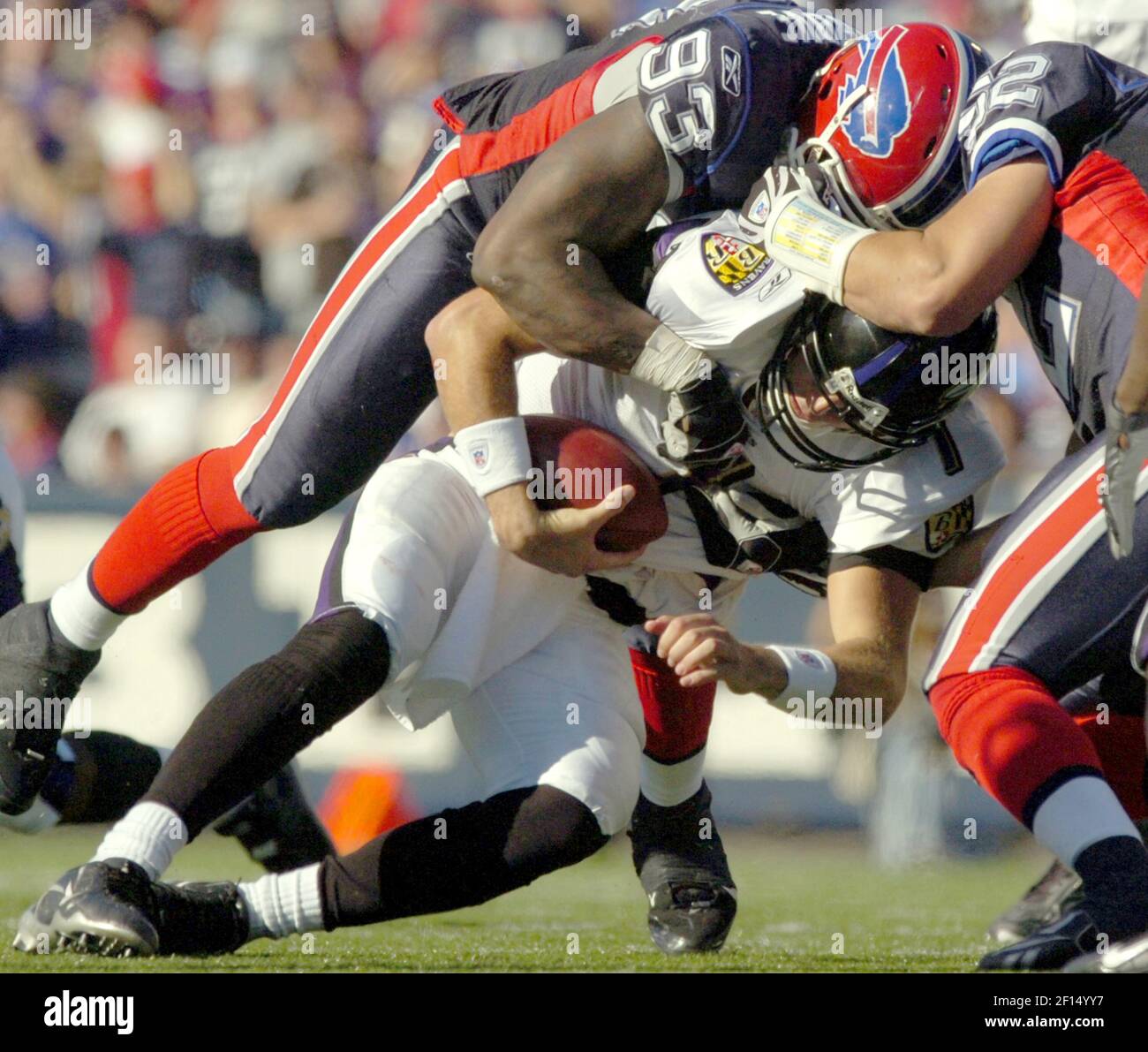 Buffalo Bills Anthony Hargrove (left) and John DiGiorgio sack Buffalo ...