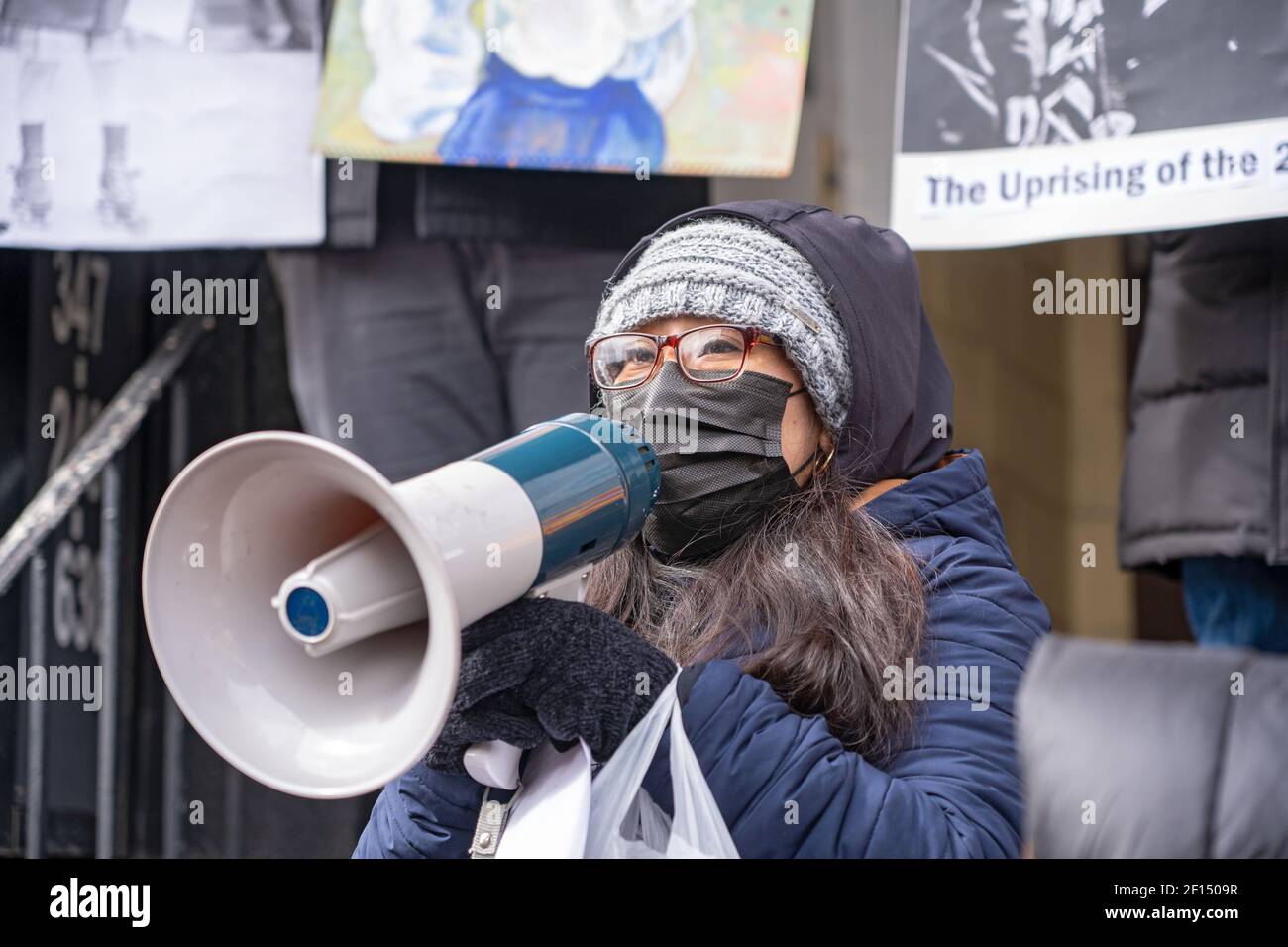 An activist speaks during the demonstration.The Liox Cleaners chain is ...