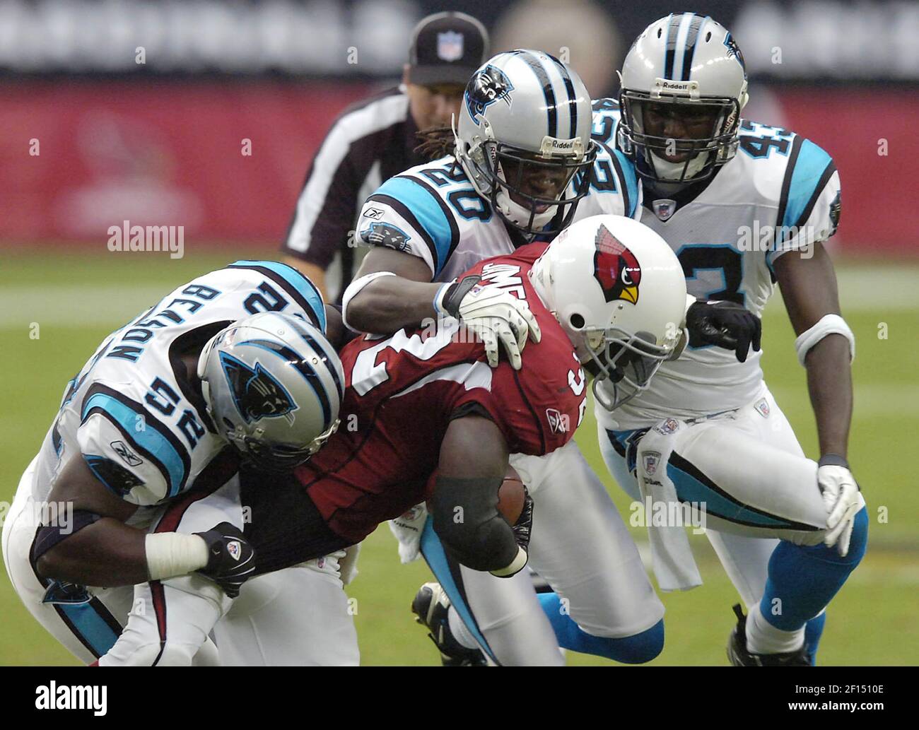 Carolina Panthers' Jon Beason (52), Chris Gamble (20), and Chris Harris ...