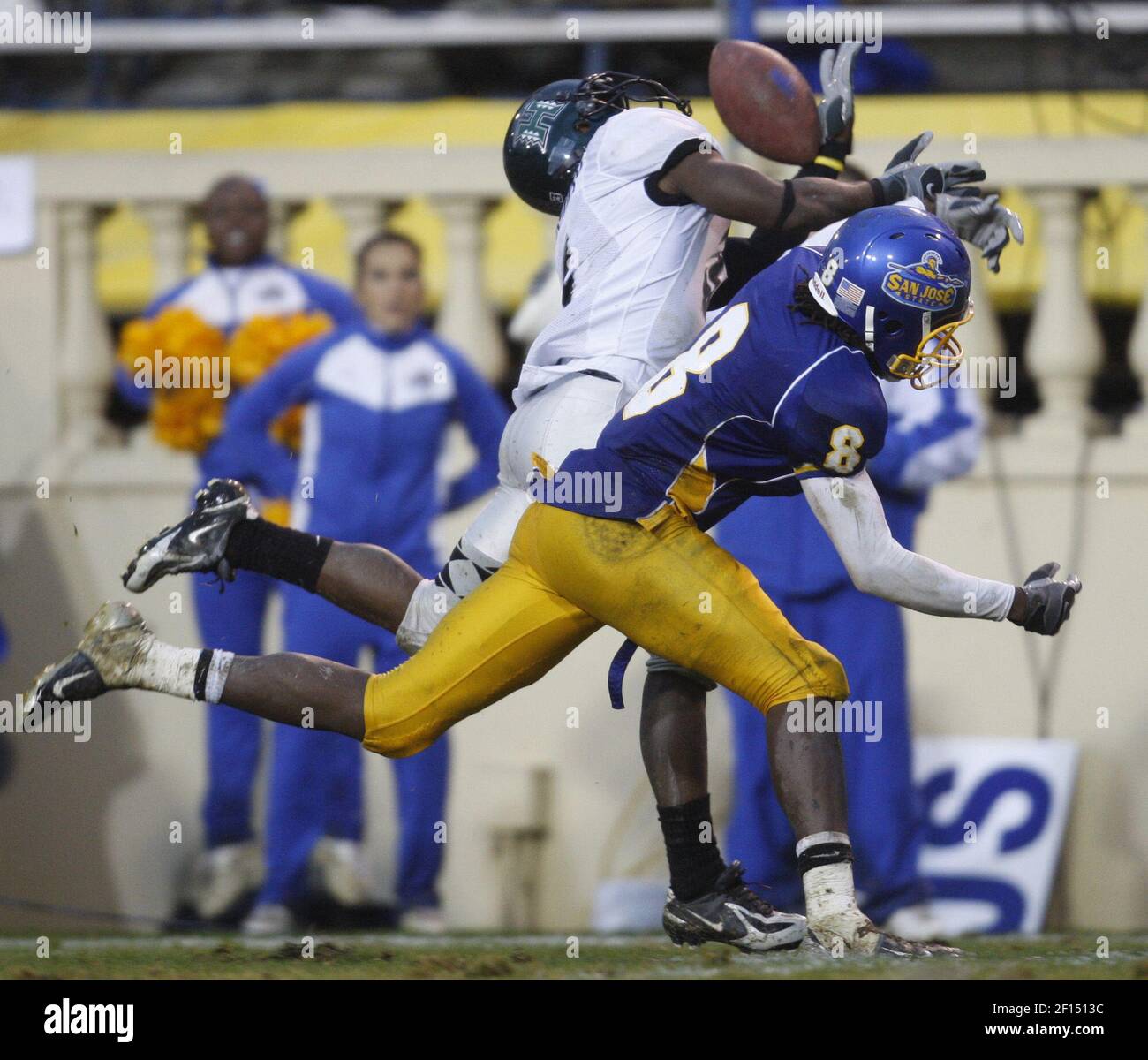 Hawaii's Myron Newberry (3) intercepts a pass intended for San Jose ...