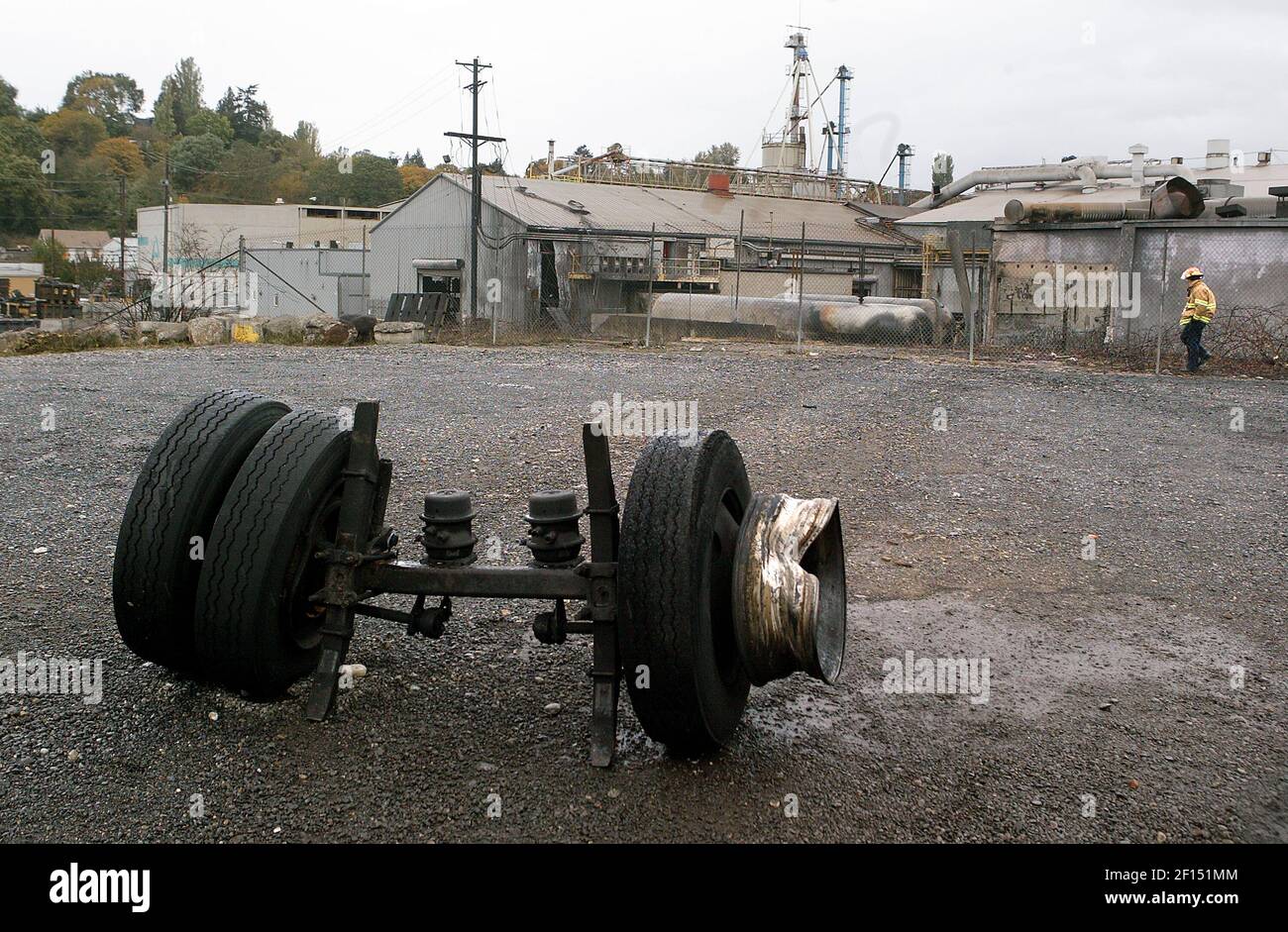 An axle and wheels traveled an estimated 300 feet from the spot where ...
