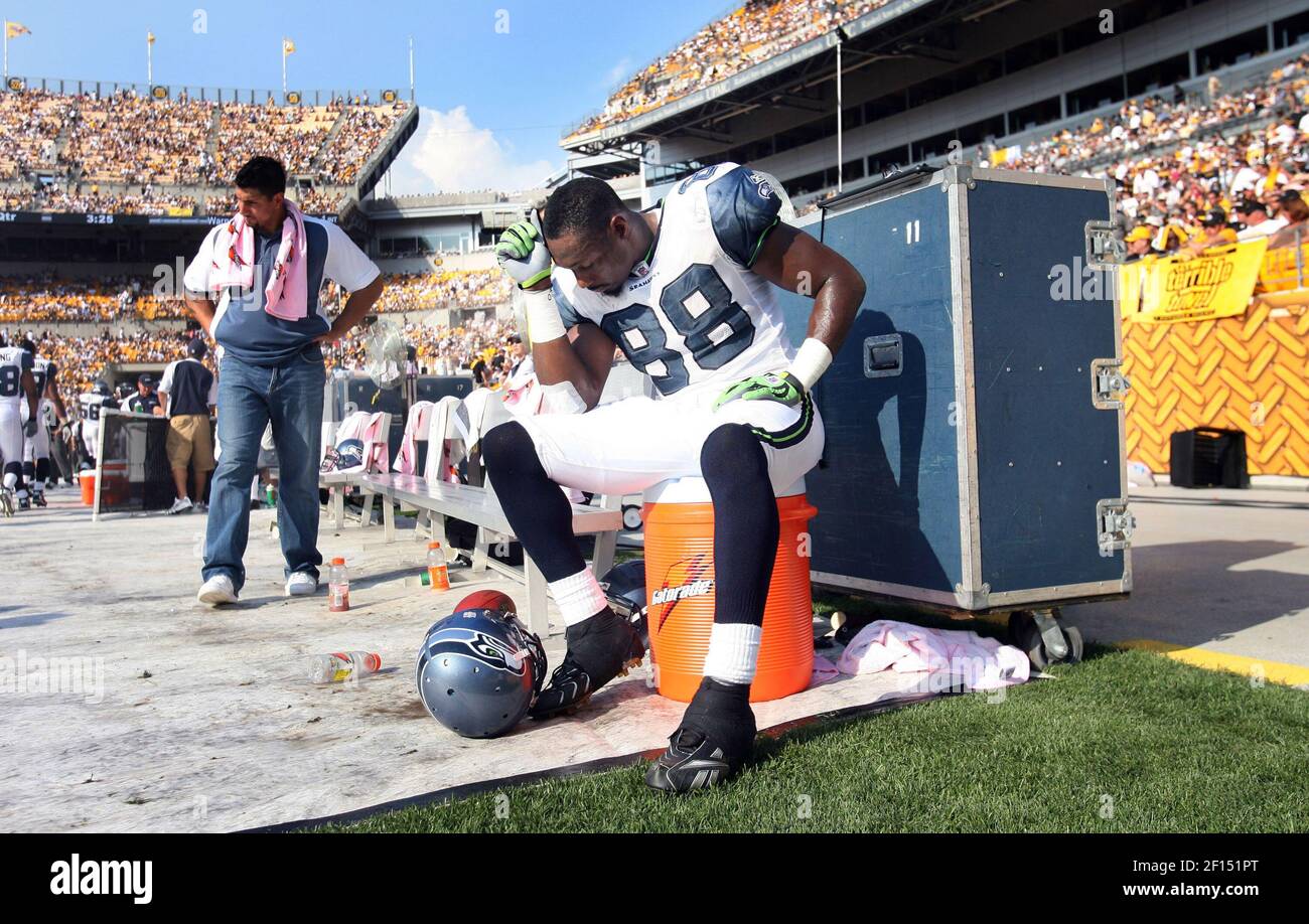 Seattle Seahawks tight end Marcus Pollard sits on a Gatorade bucket in ...