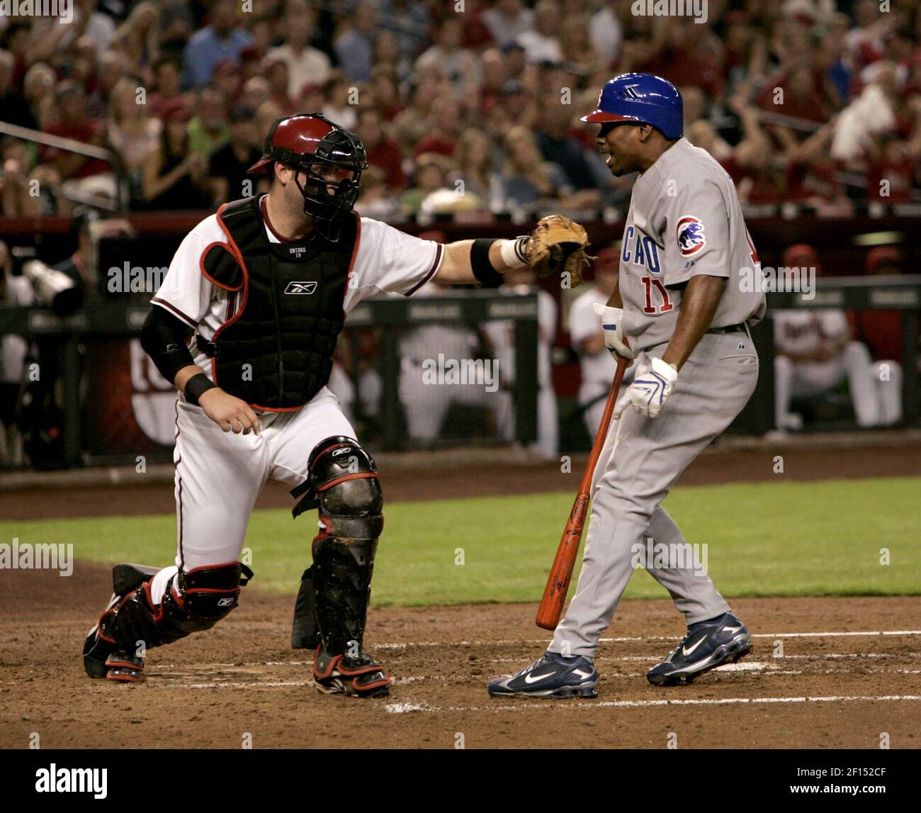 Chicago Cubs Jacque Jones is tagged out by Arizona Diamondbacks catcher ...