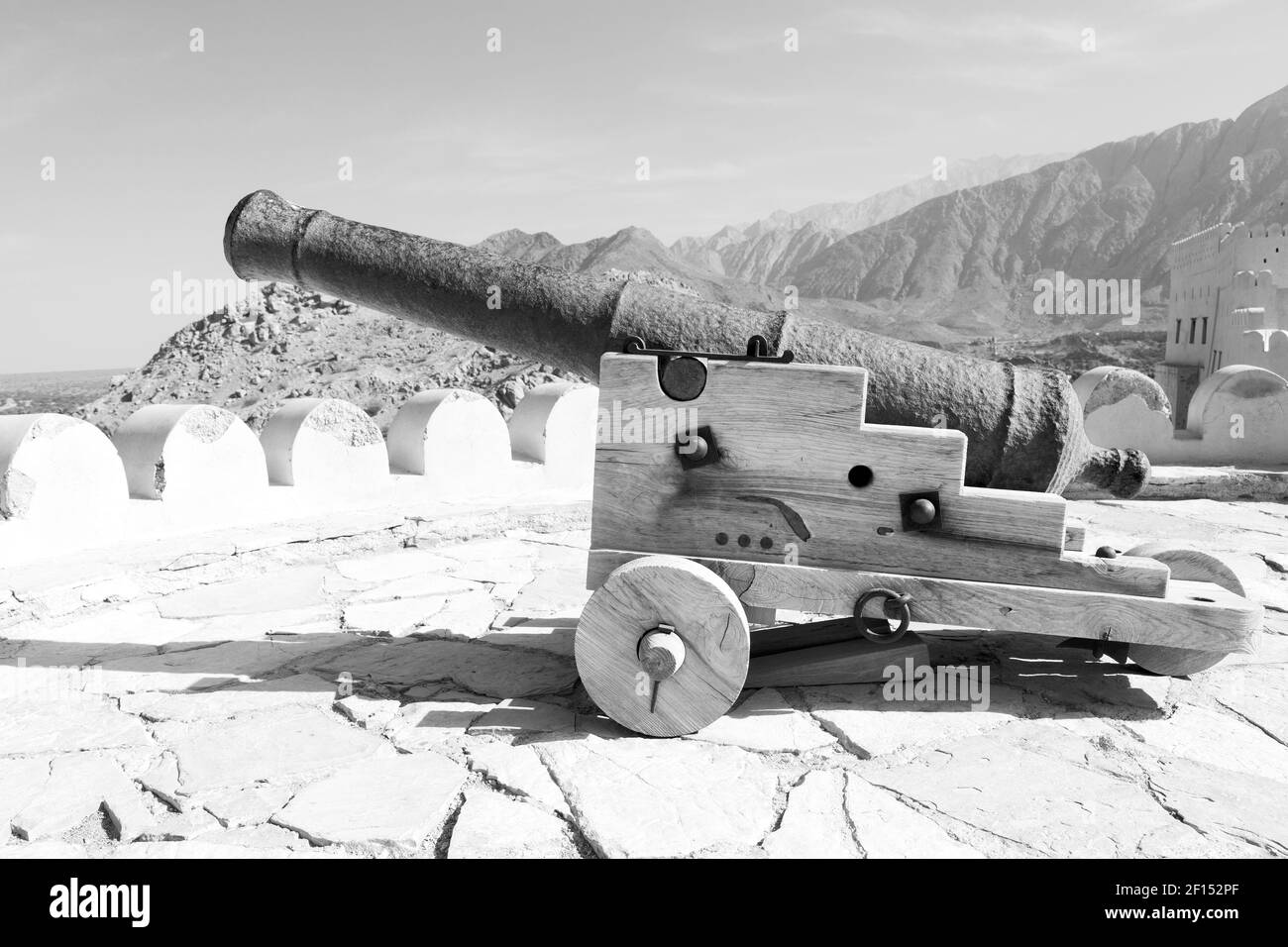 In oman muscat the old castle and cannon near the wall Stock Photo - Alamy