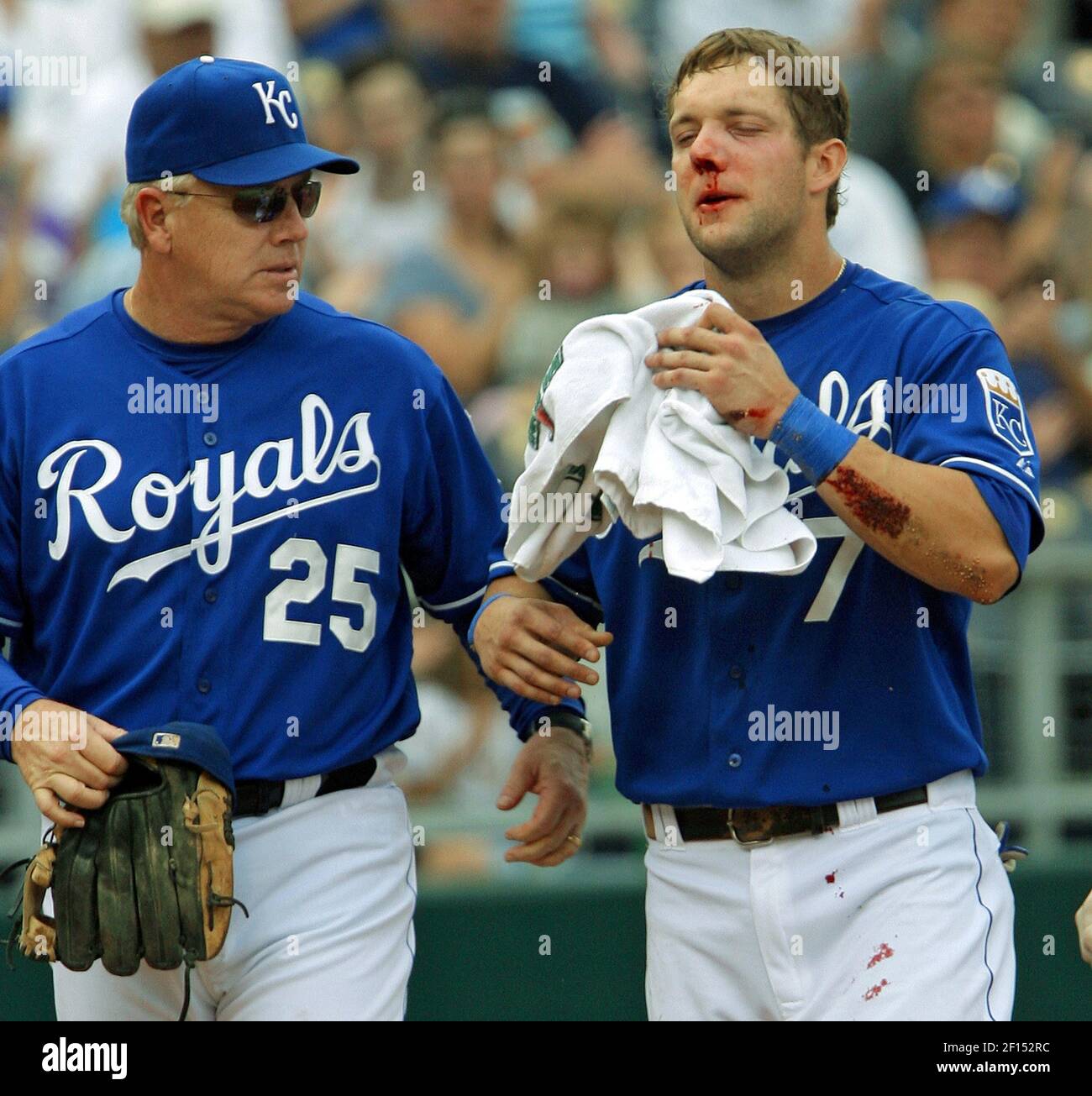 Kansas City Royals third baseman Alex Gordon walks off the field with ...