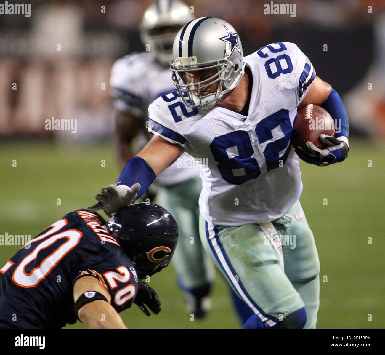 Dallas Cowboys tight end Jason Witten (82) is hit by the Chicago Bears ...