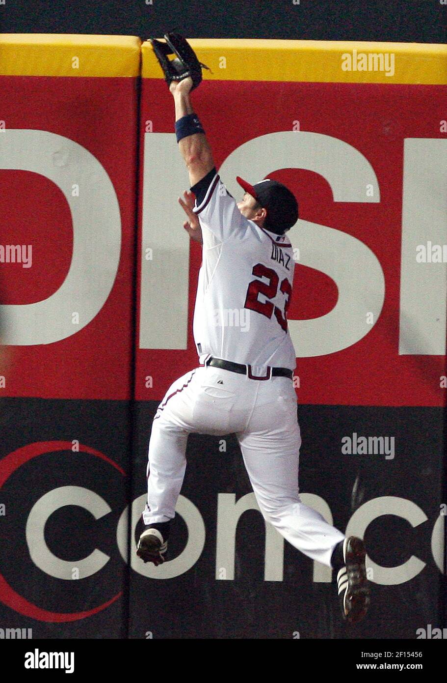 Atlanta Braves left fielder Matt Diaz catches a ball from Milwaukee ...