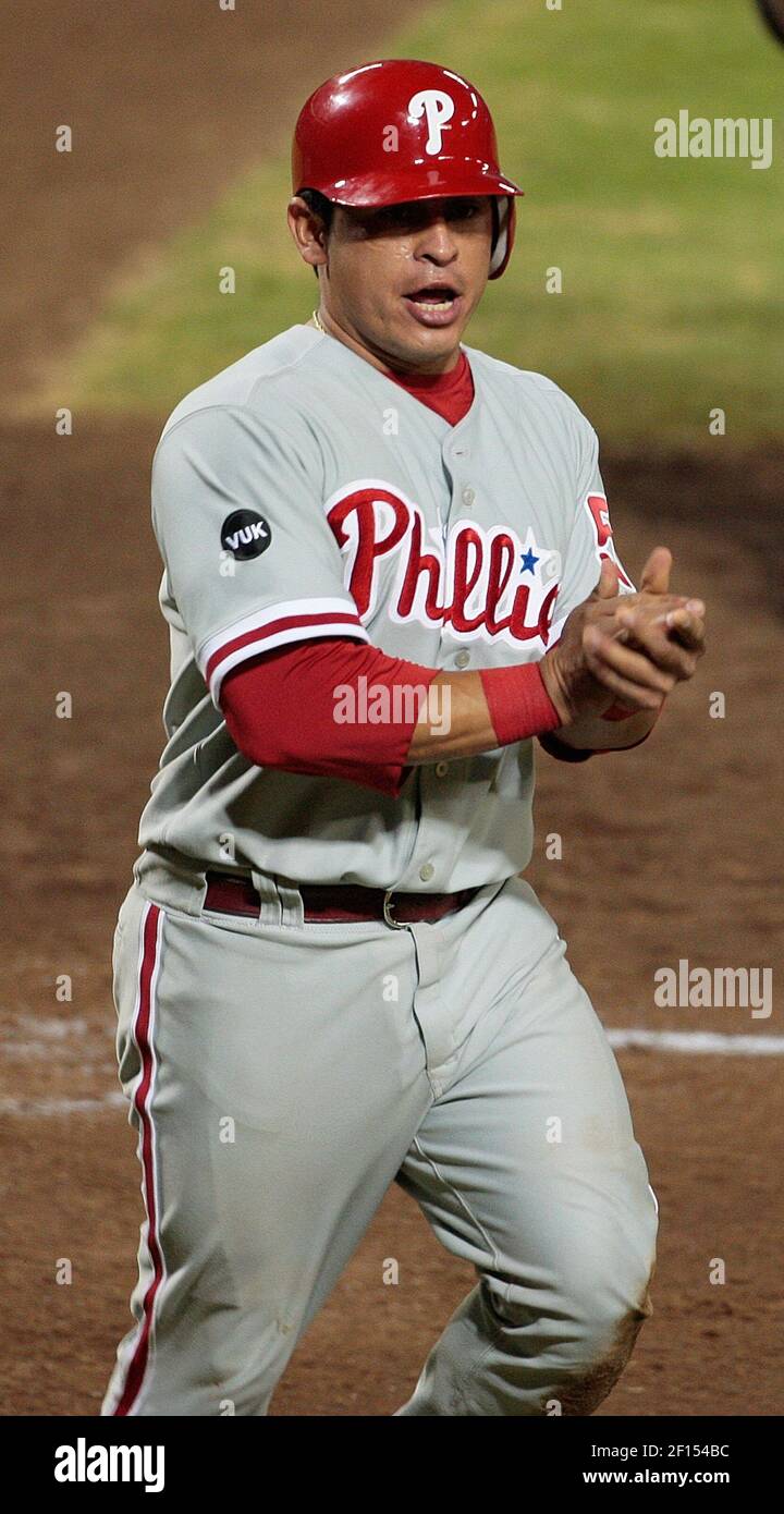 Philadelphia Phillies Carlos Ruiz (51) celebrates after scoring the go ...