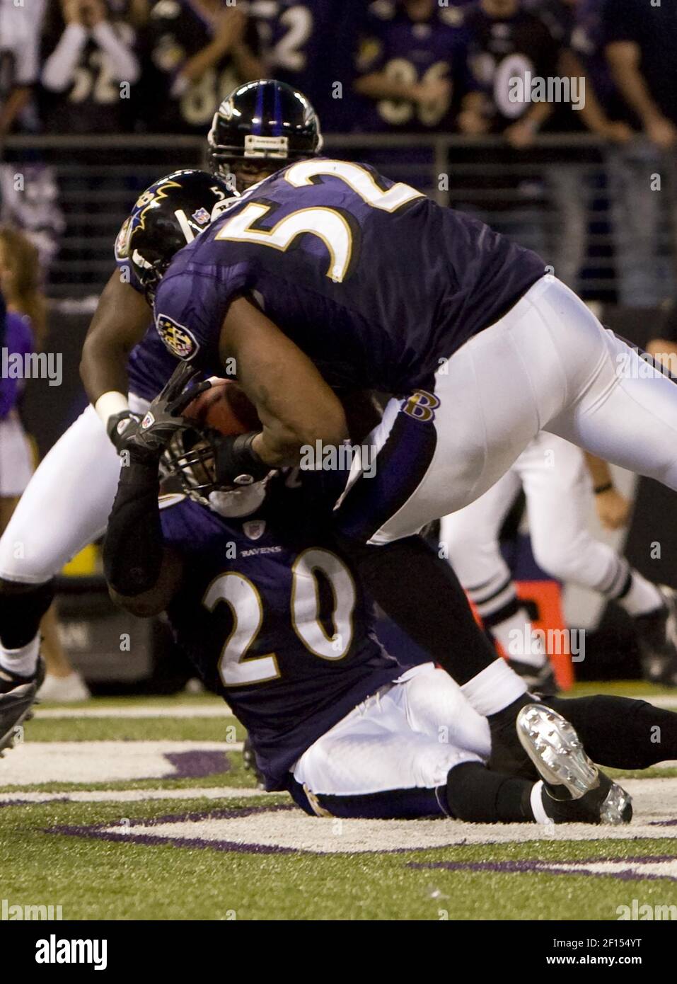 The Baltimore Ravens' Ray Lewis (52) pulls in an interception in the ...