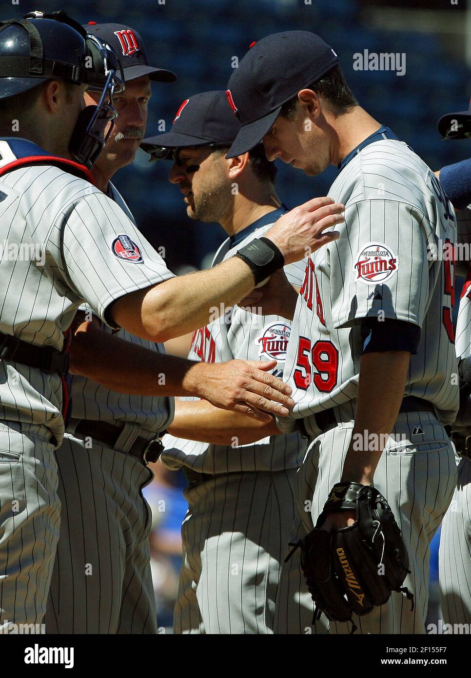 Minnesota Twins pitcher Kevin Slowey receives a visit from pitching ...