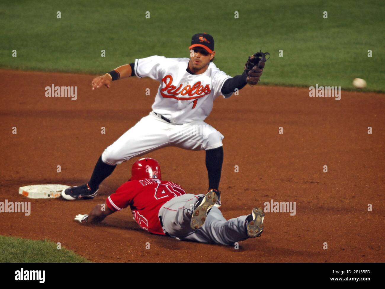 The throw sales wide of the Baltimore Orioles' Brian Roberts as the Los ...