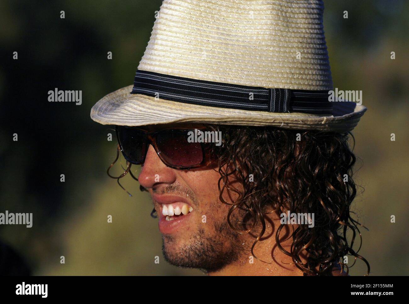 Matt Ratoni wears his favorite hat while he skimboards on the American ...