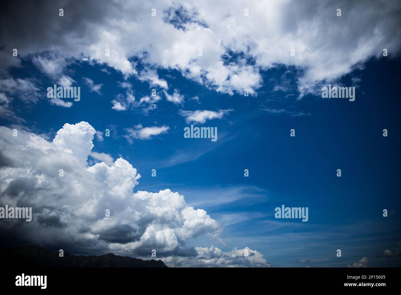 Deep blue sky with stratocumulus clouds Stock Photo - Alamy