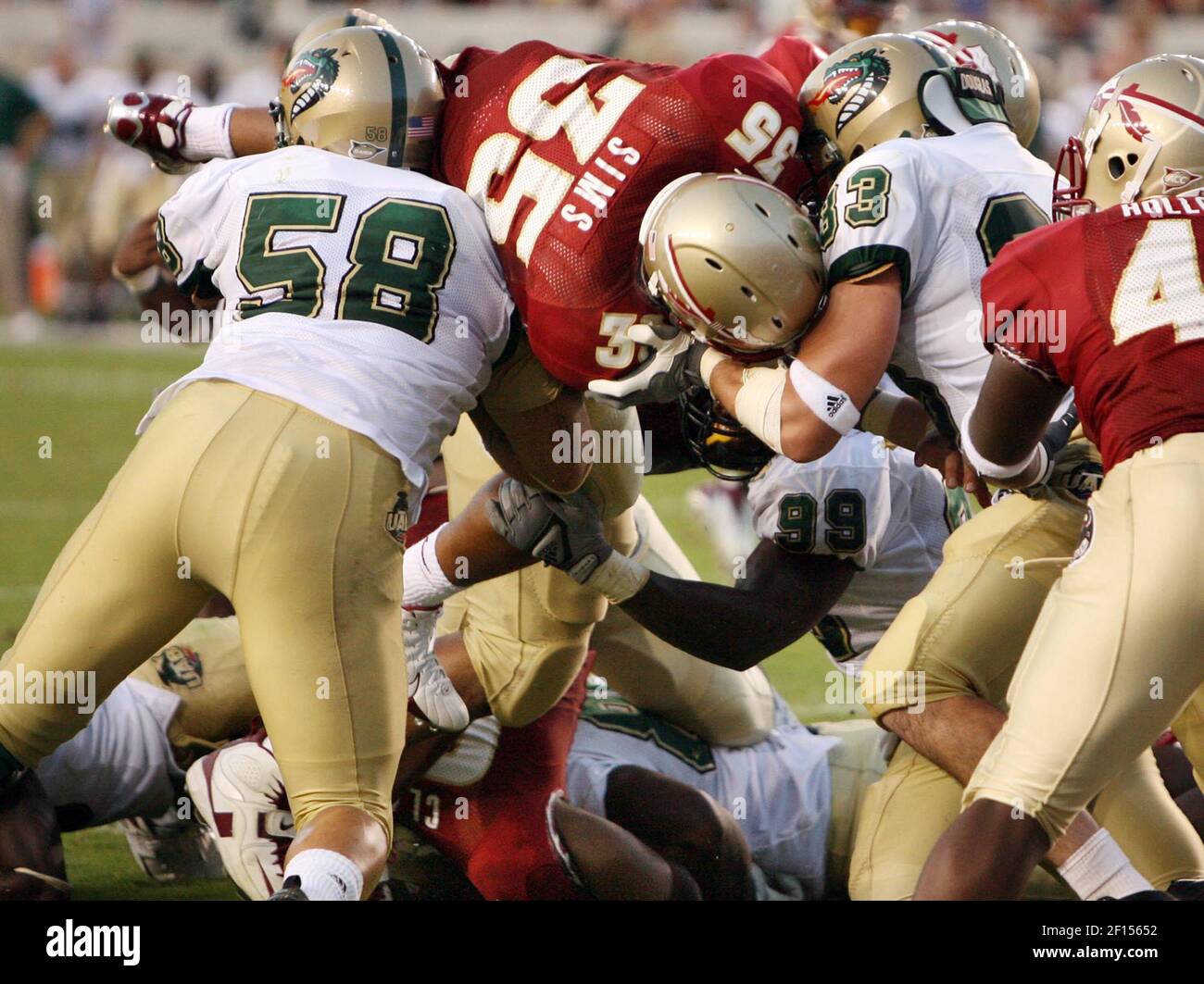 Florida State fullback Marcus Sims flies over the University of Alabama ...