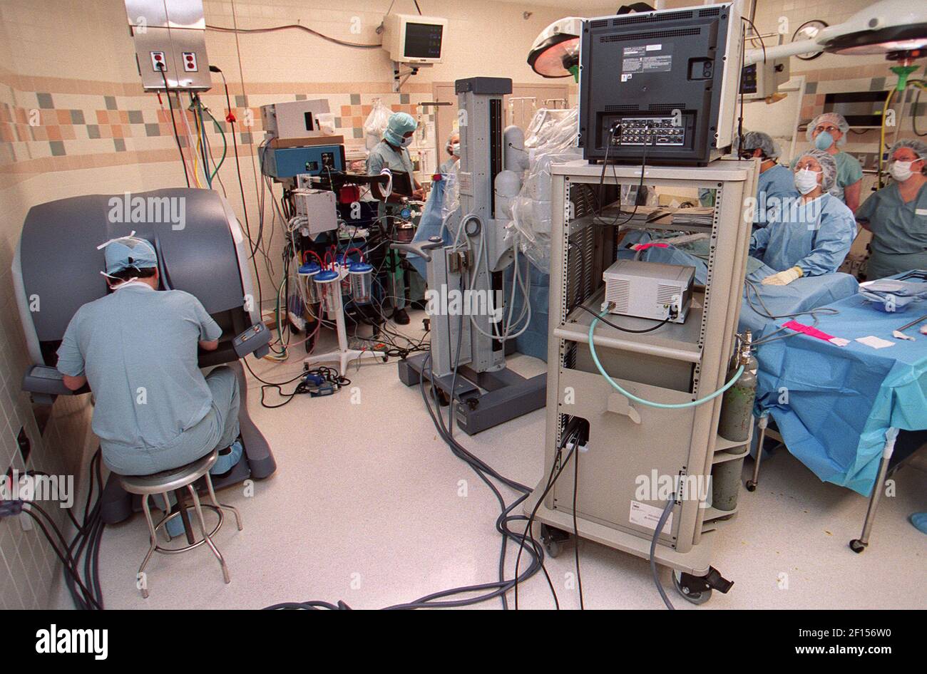 Dr. Pat Pappas uses a da Vinci Surgical Systems robotic machine to ...