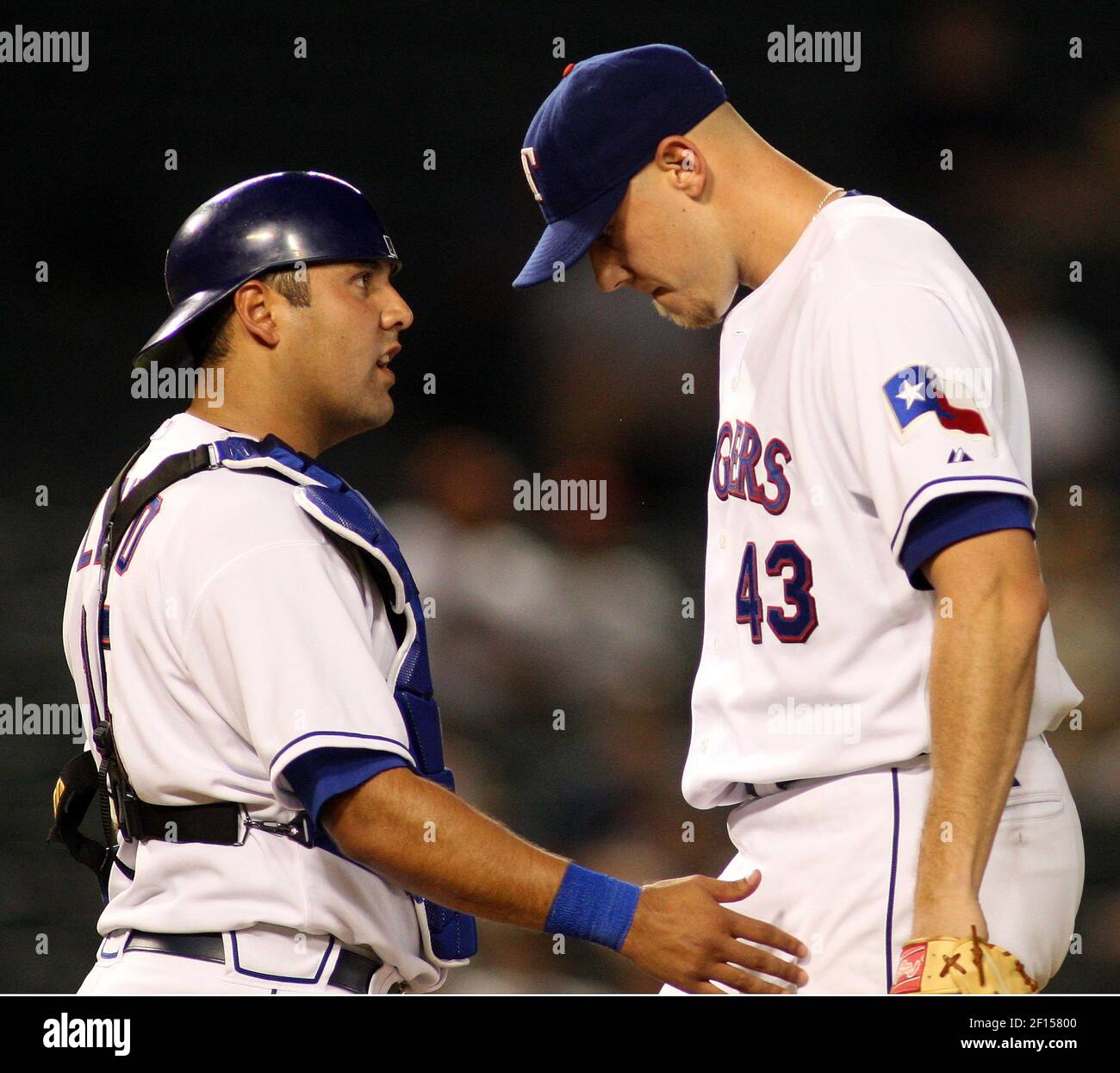 Texas Rangers catcher Gerald Laird (left) and starting pitcher Kameron ...