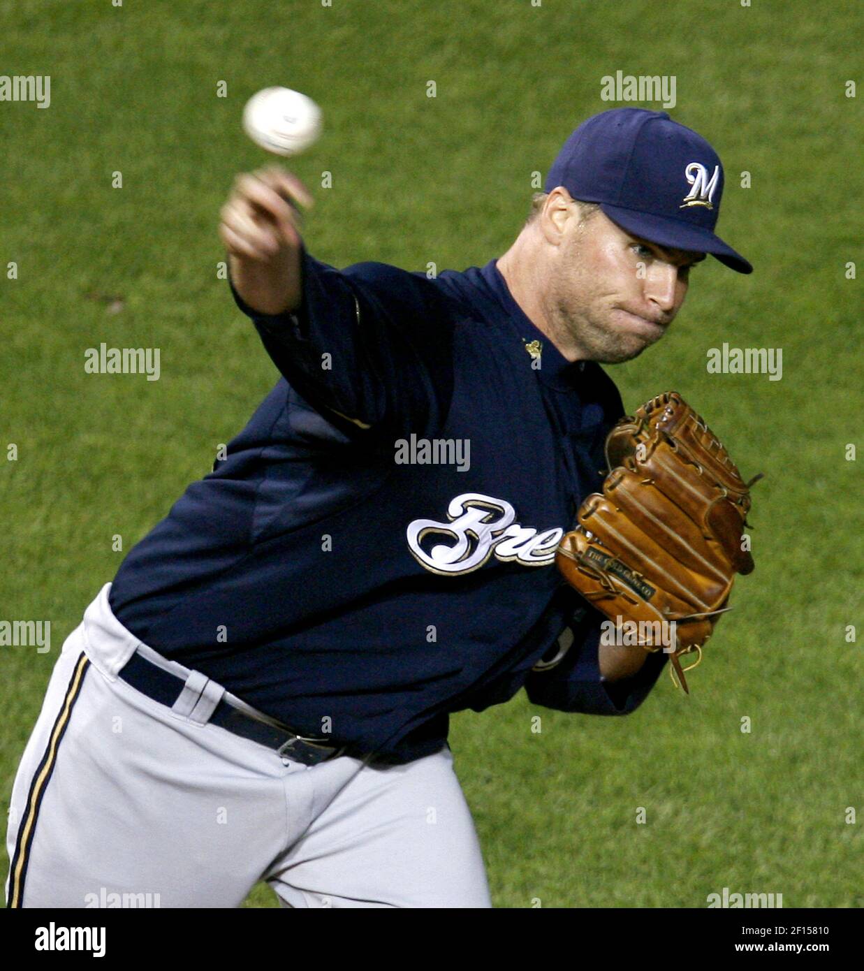 Milwaukee Brewers pitcher Ben Sheets attempts to throw out Chicago Cubs ...