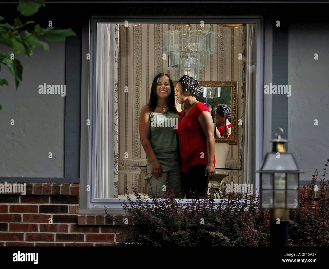 Marie Walzer, left, and daughter Nina, pose for portrait at their home ...