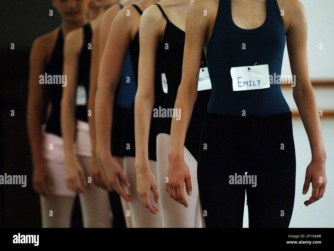 Girls line up at a ballet class during a month long summer boarding ...