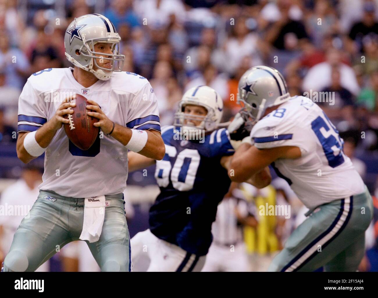 Dallas Cowboys' Tony Romo drops back to pass in the second quarter ...