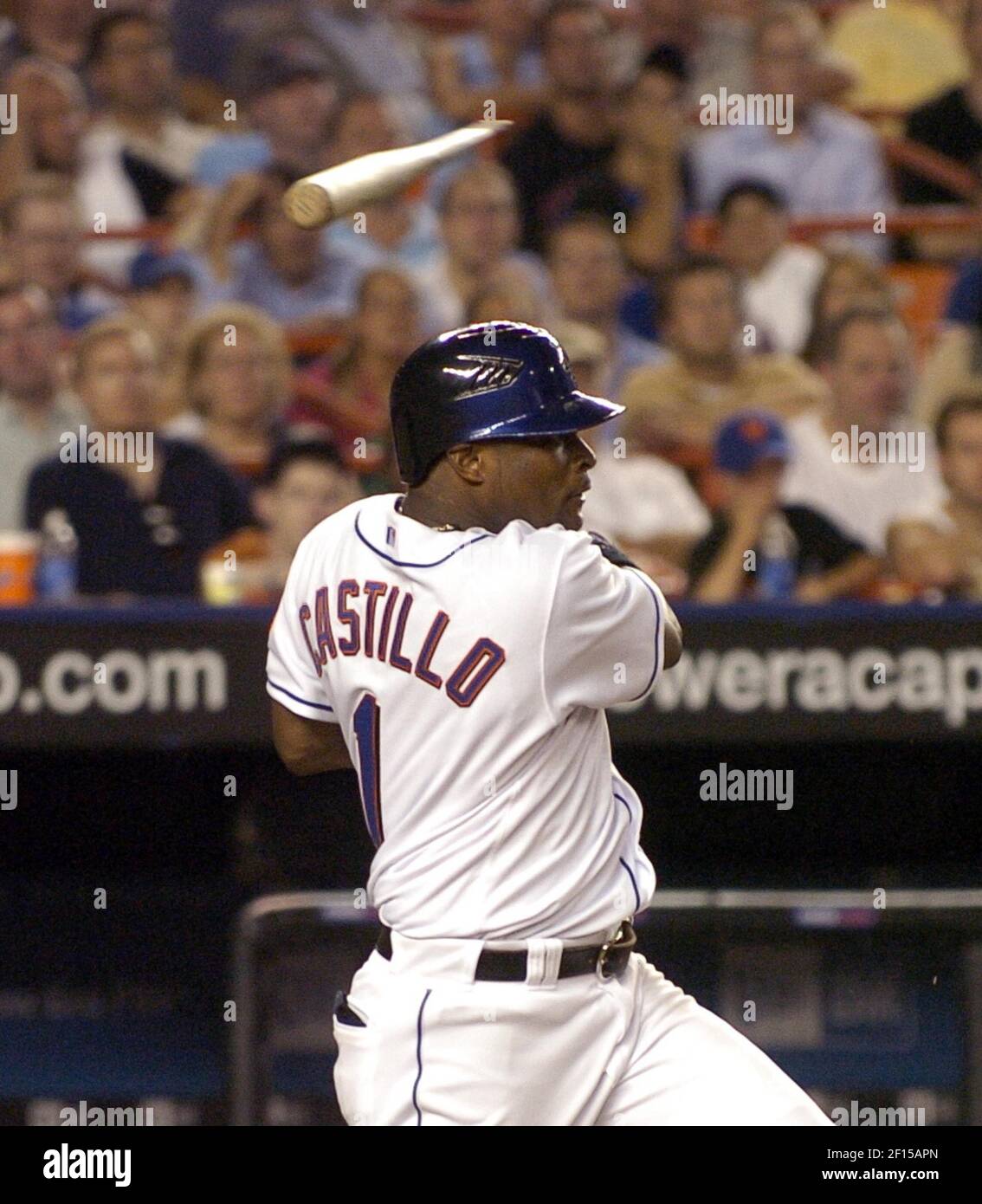 New York Mets Luis Castillo breaks his bat hitting a two-run single in ...