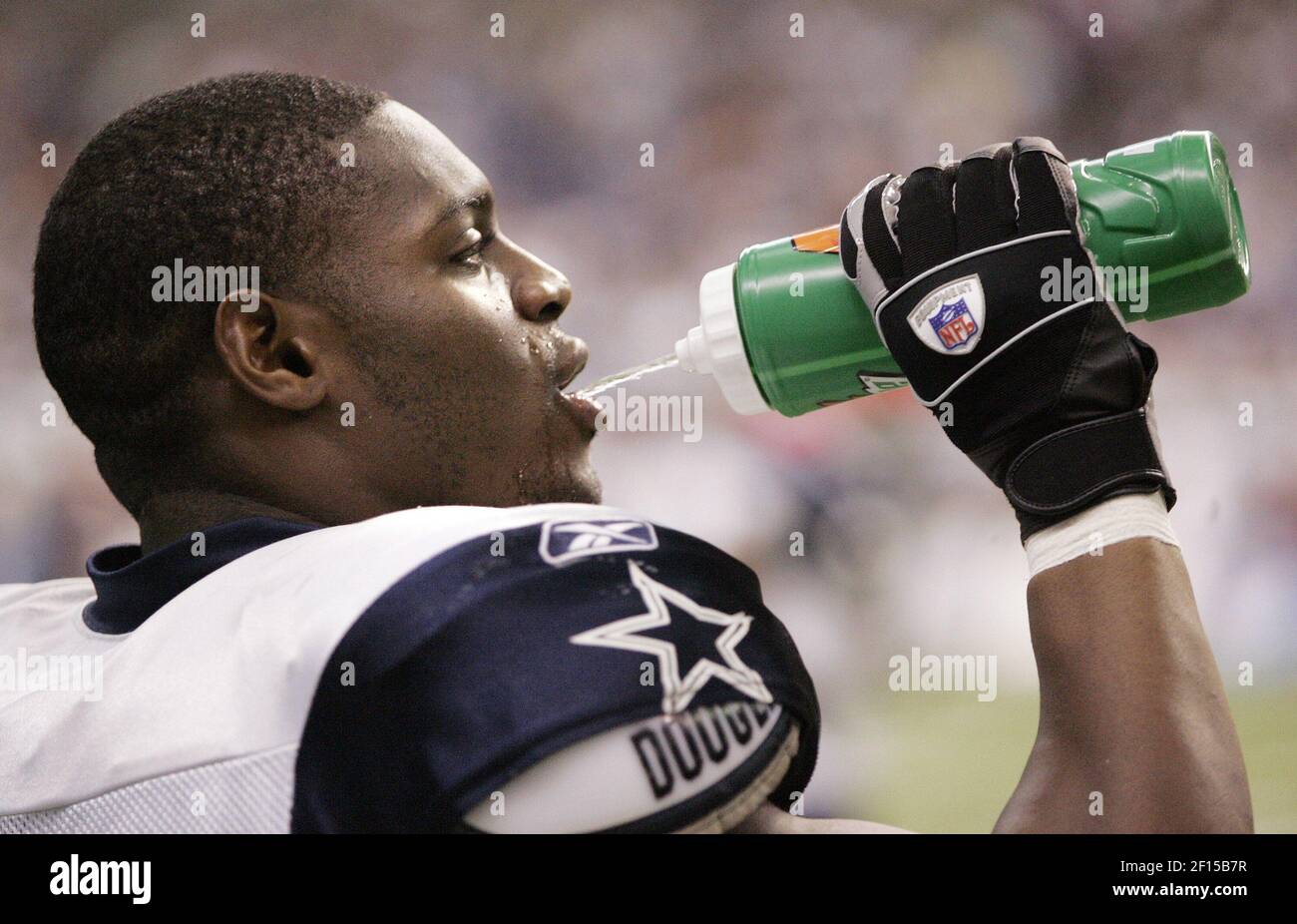 Dallas Cowboys running back Julius Jones drinks water during the Dallas ...