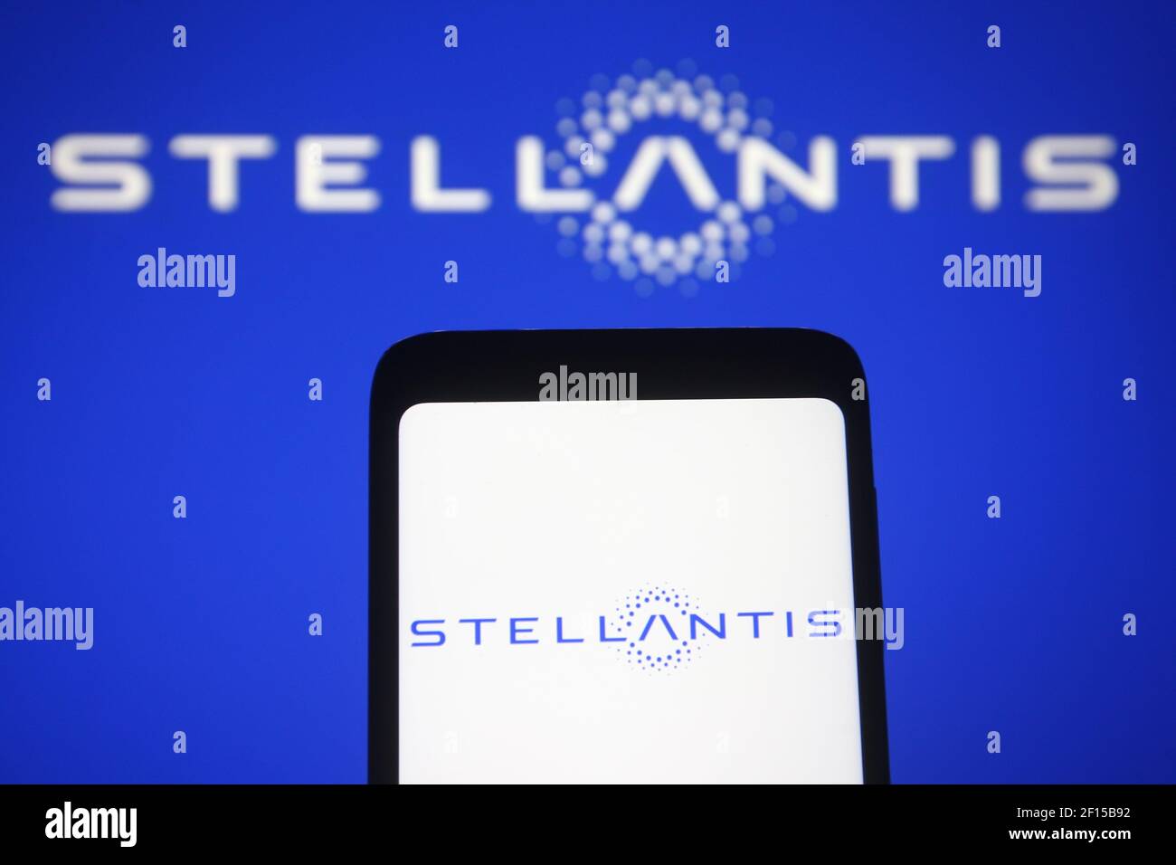 In this photo illustration a Stellantis logo of a multinational ...