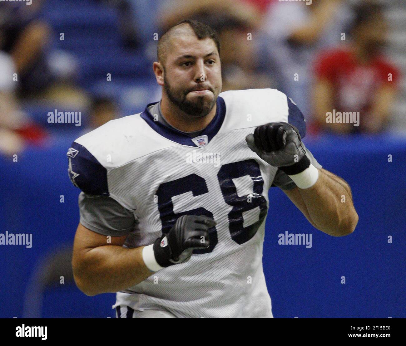 With his rookie haircut, Dallas Cowboys tackle Doug Free warms up ...