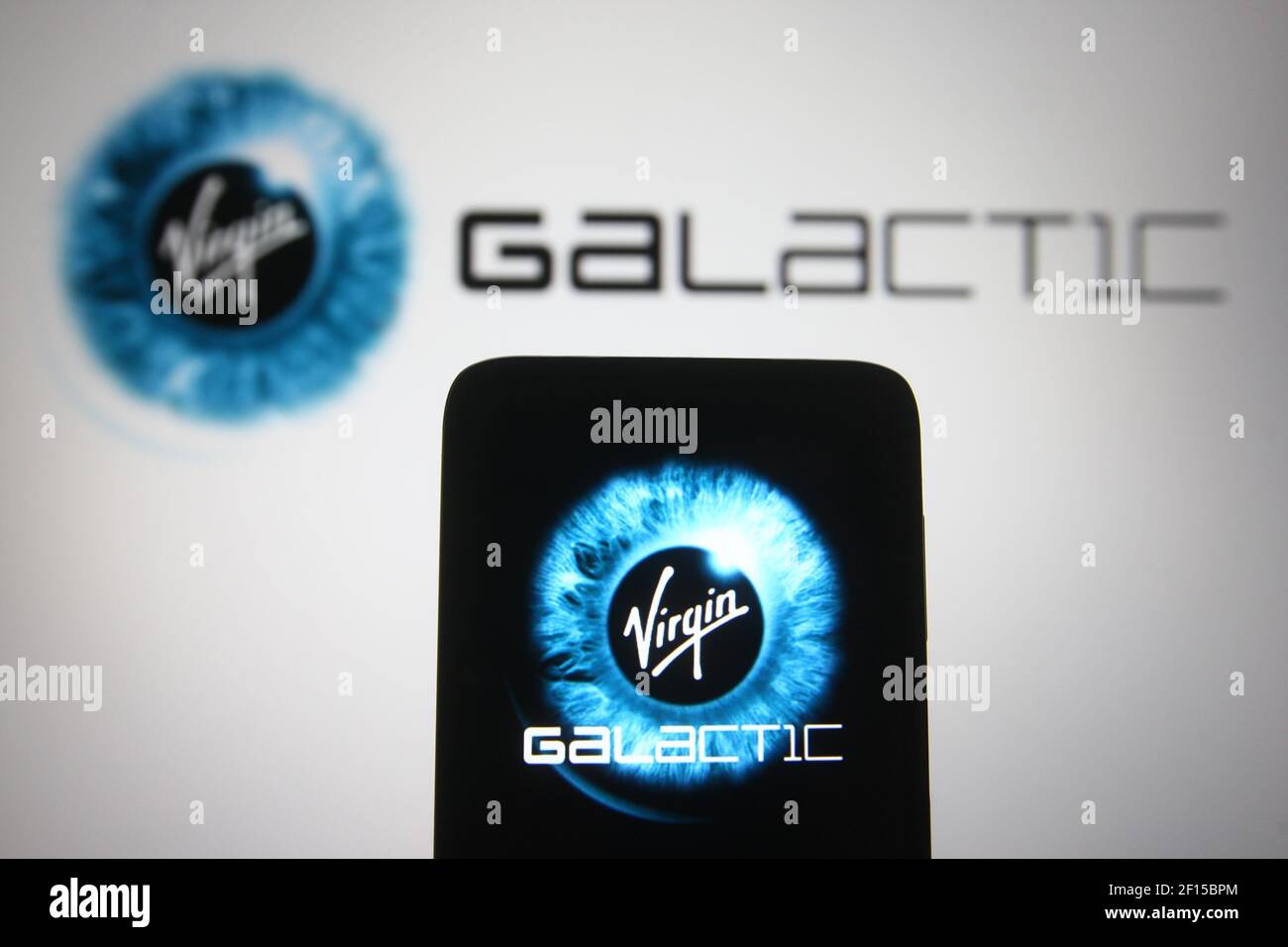 In this photo illustration the Virgin Galactic logo of US spaceflight ...