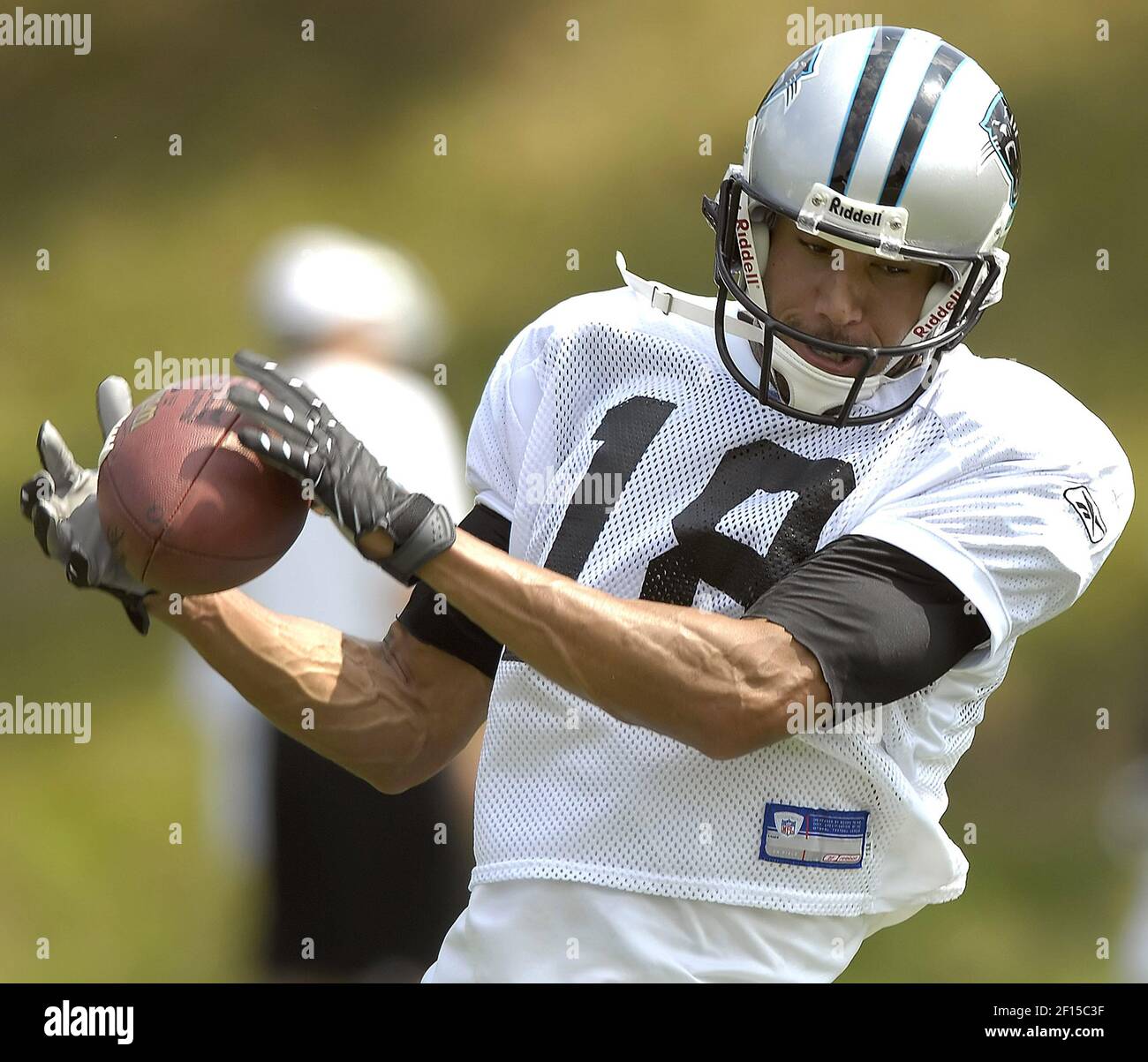 Carolina Panthers wide receiver Drew Carter begins to turn upfield as ...