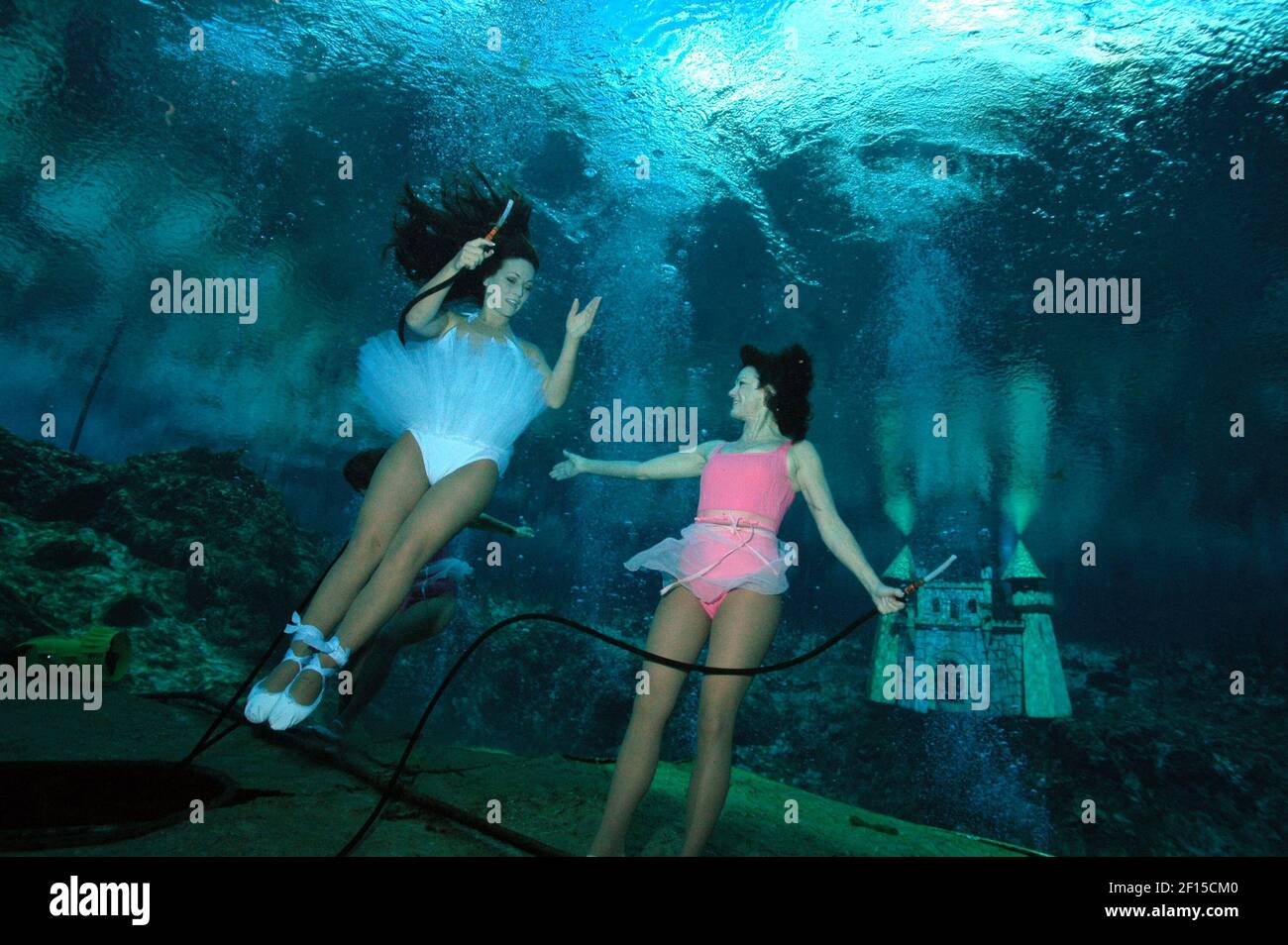 Former mermaid Barbara Wynns, right, performs with current mermaid ...