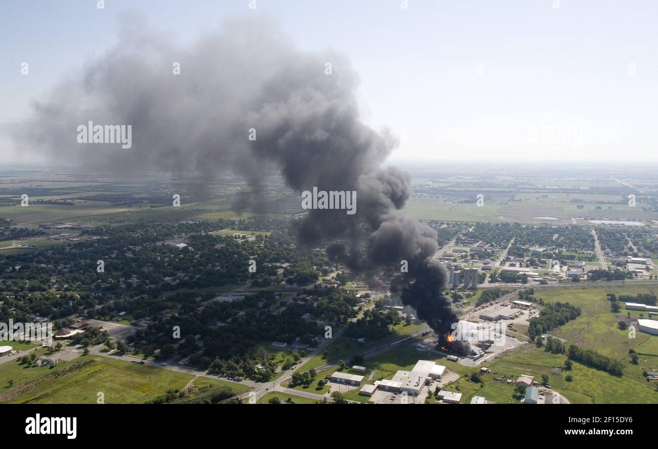 Valley Center is covered in a plume of smoke as storage tanks burn at ...
