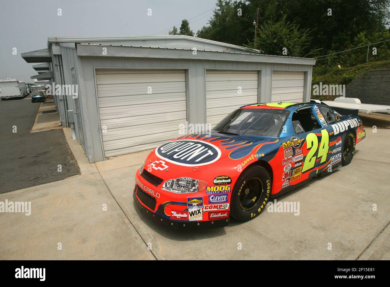 A showcar of Jeff Gordon sits outside the original garage at Hendrick ...