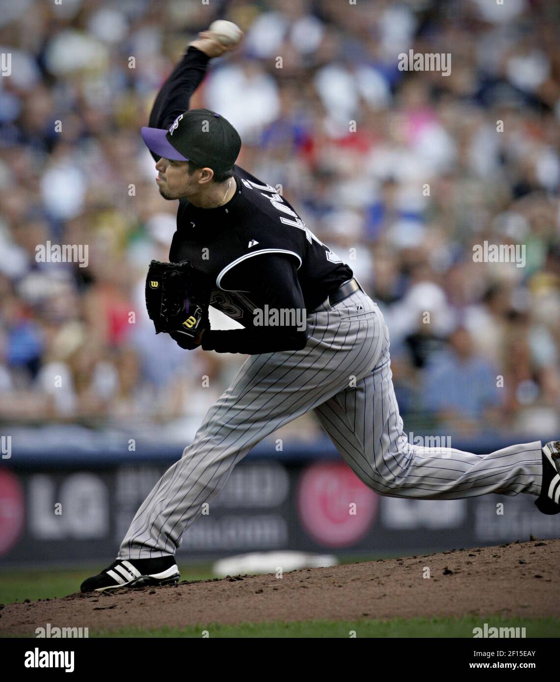 Colorado Rockies pitcher Rodrigo Lopez pitches against the Milwaukee ...