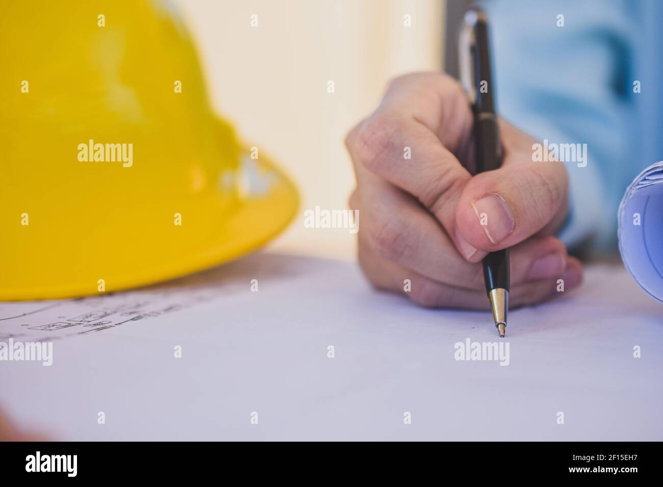 Close up Engineer drawing design on paper work in office Stock Photo ...