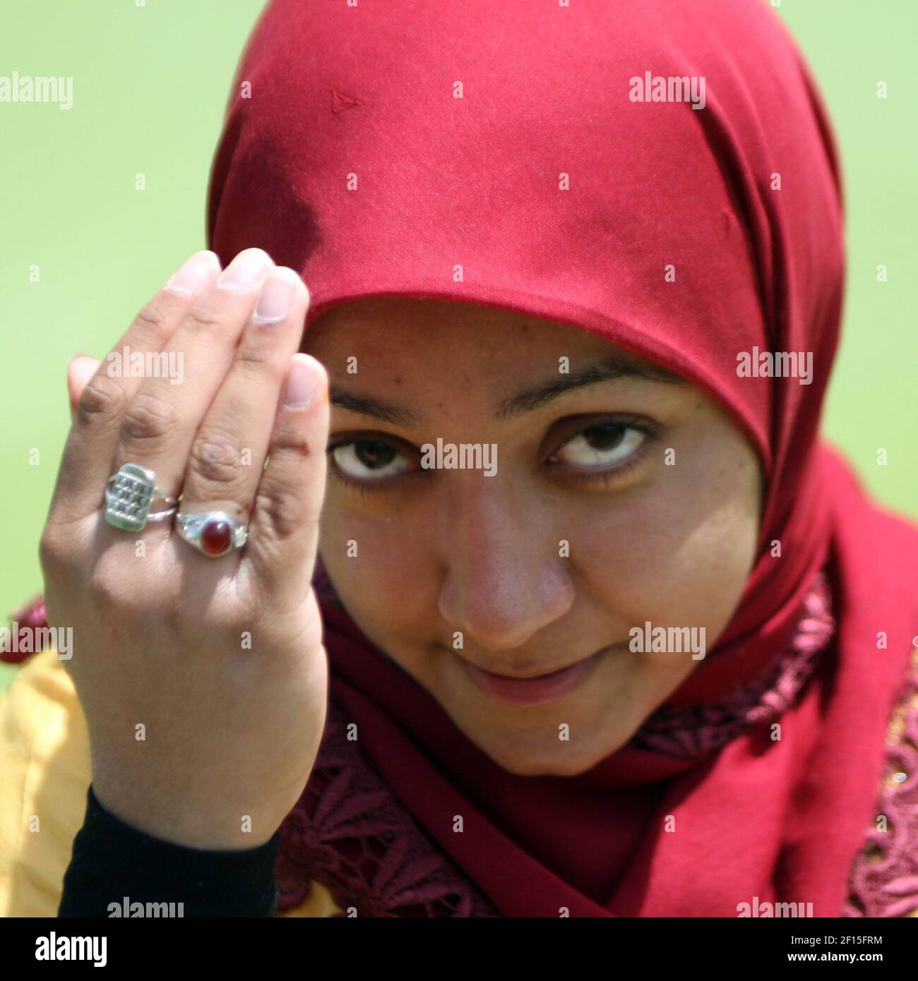 Sukaina Hussain demonstrates the Pakistani gesture for 'hello' with a ...