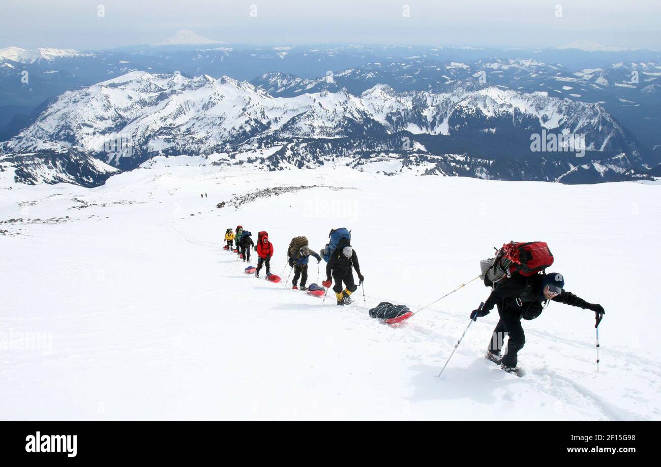 Alpine Ascents International guide an expedition towards Camp Muir at ...