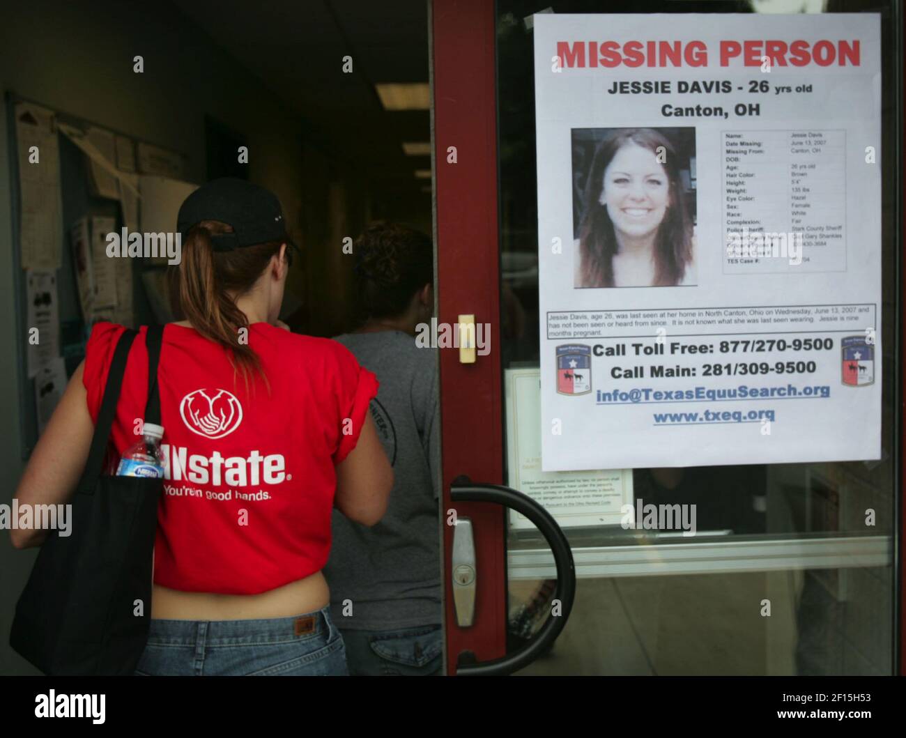 A missing person sign is posted on the door of the Greentown Fire ...