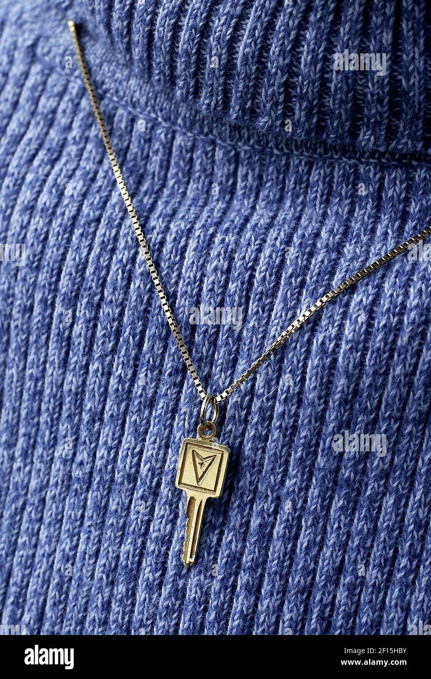 Evelyn Schmidt wearsa a key-shaped necklace was a gift from her son ...
