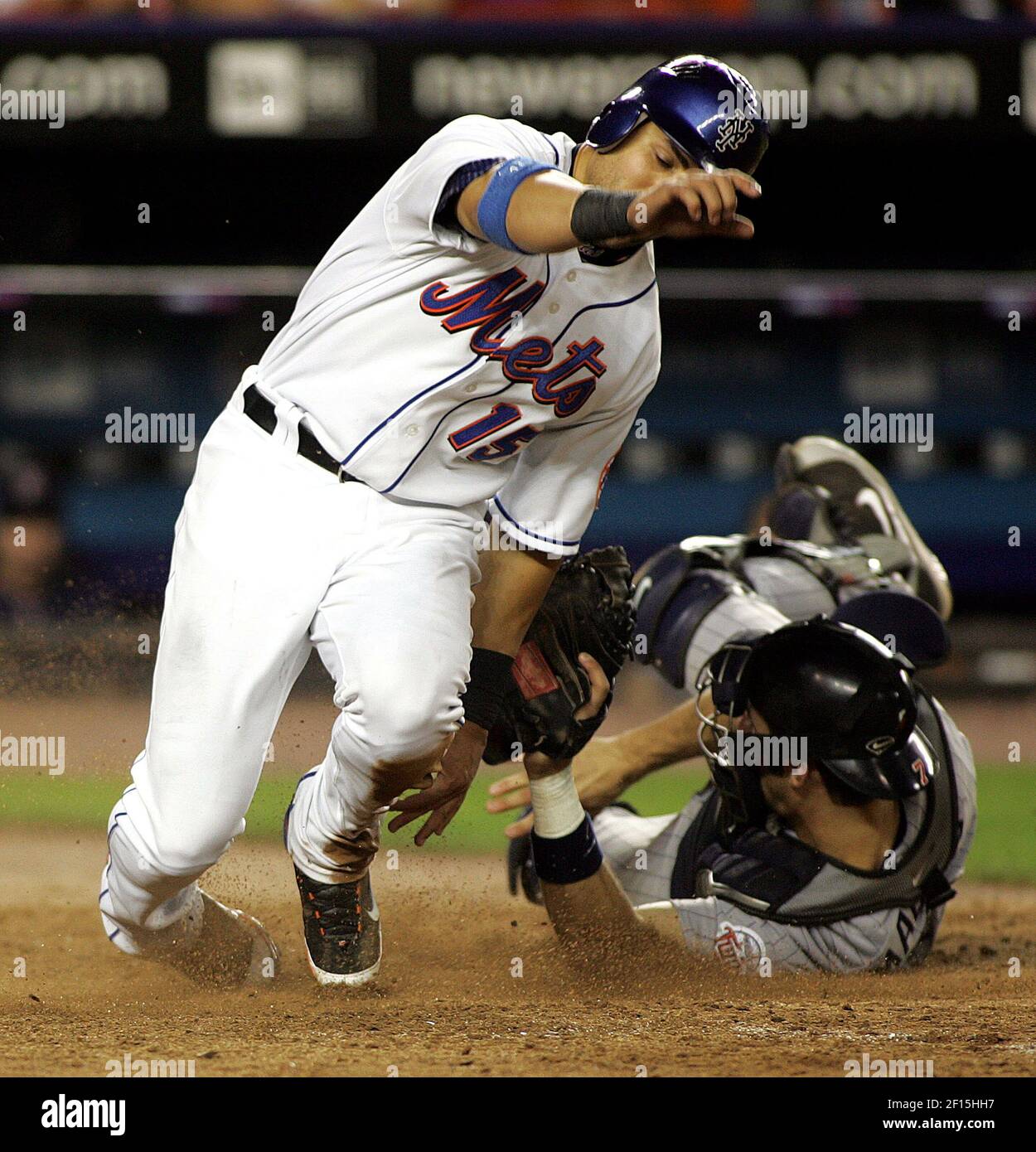 New York Mets' Carlos Beltran scores safely by Minnesota Twins' Joe ...