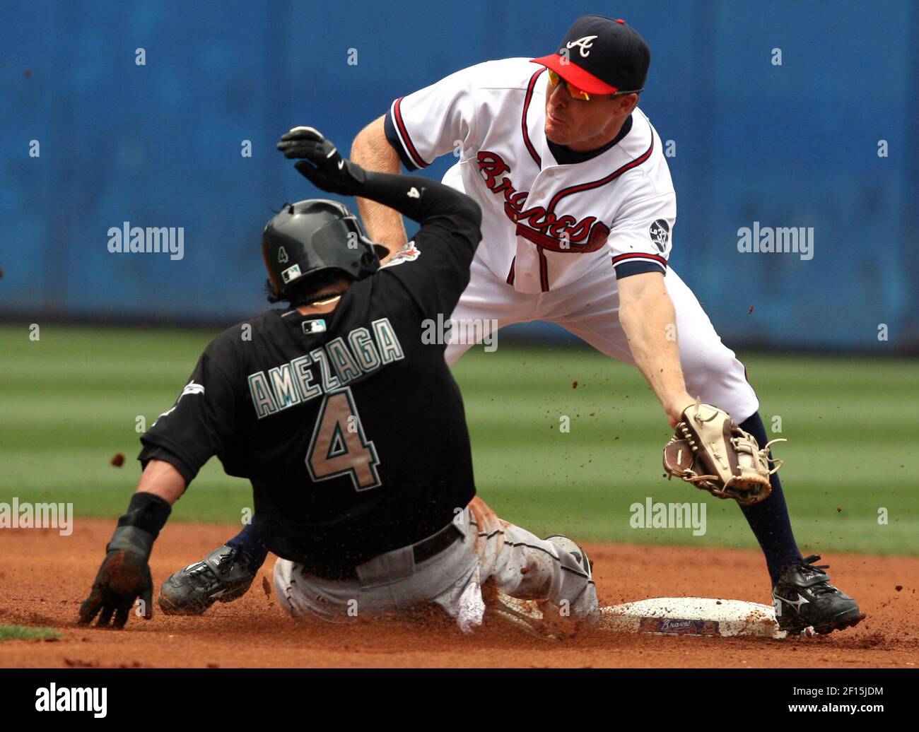 Atlanta Braves second baseman Pete Orr reaches to tag Florida Marlins ...