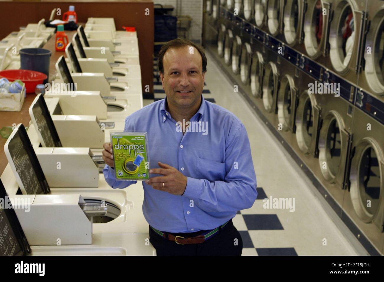 John Propper holds his Dropps detergent at a laundromat in Philadelphia ...