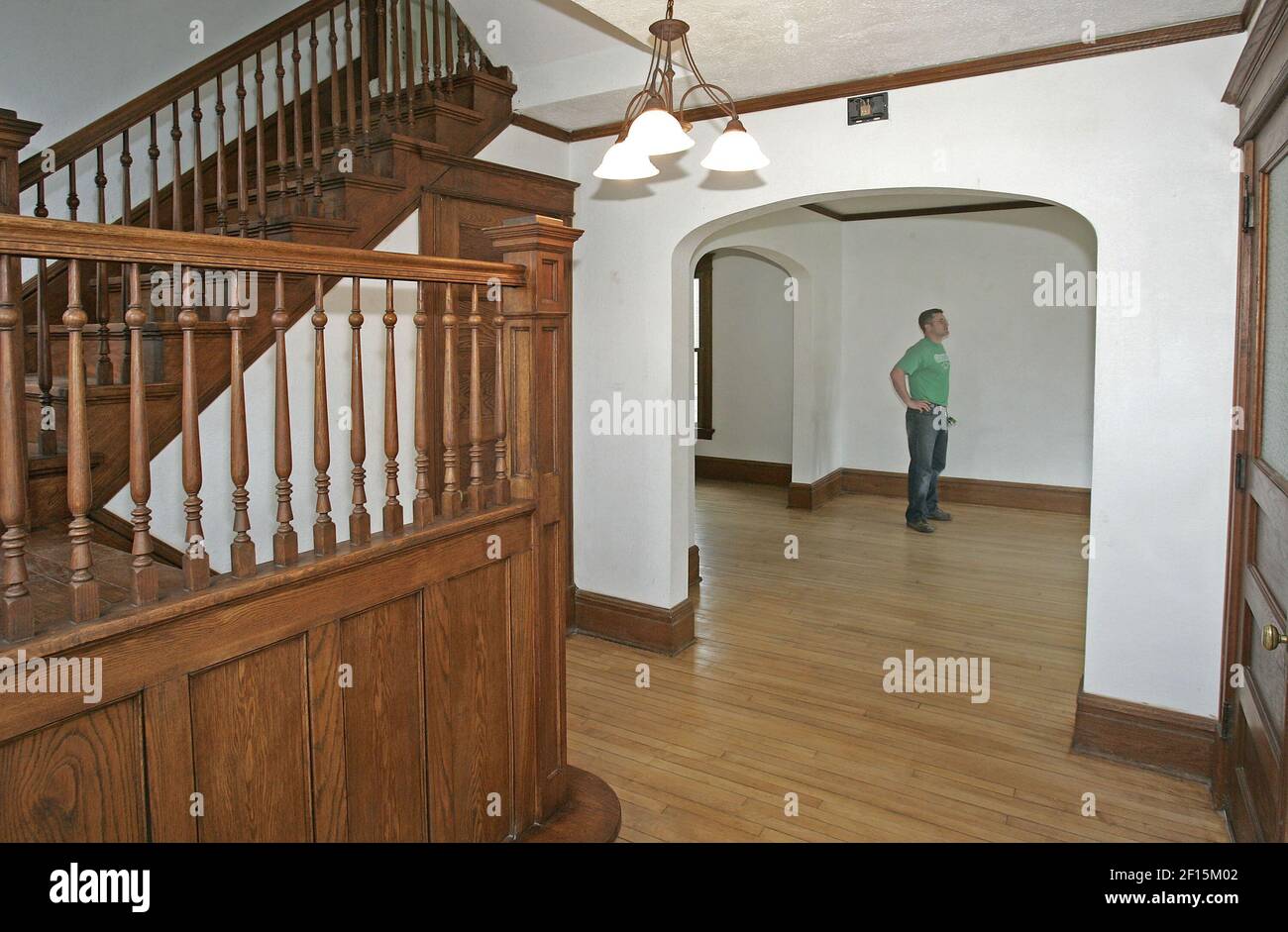 Dan Gustin stands in a home he rehabbed in South Milwaukee, Wisconsin ...