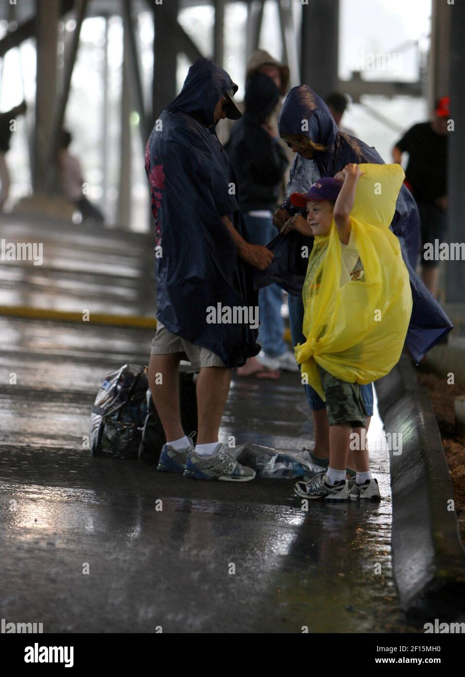 Ryder Boring, 6, right, his grandfather Joe Machnik, left, and mother ...