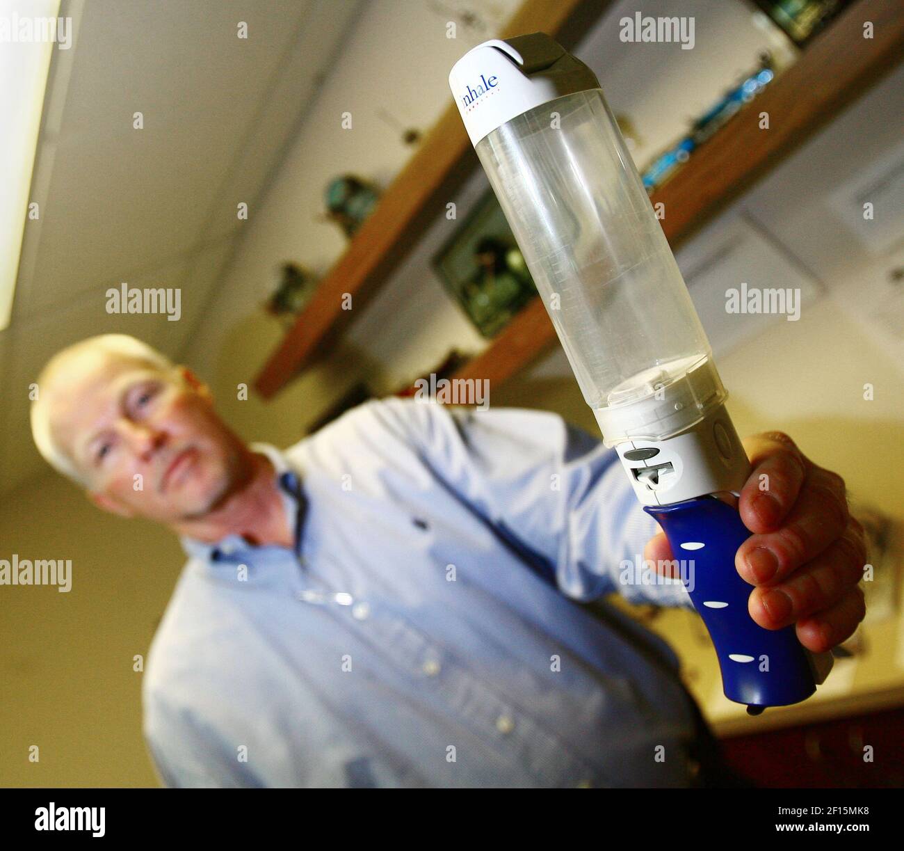 Steve Moore of Richardson shows off his insulin inhaler, a convenient ...