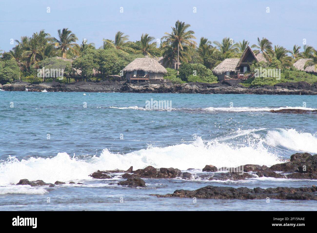 At Kona Village Resort thatched-roof bungalows reflect traditional ...