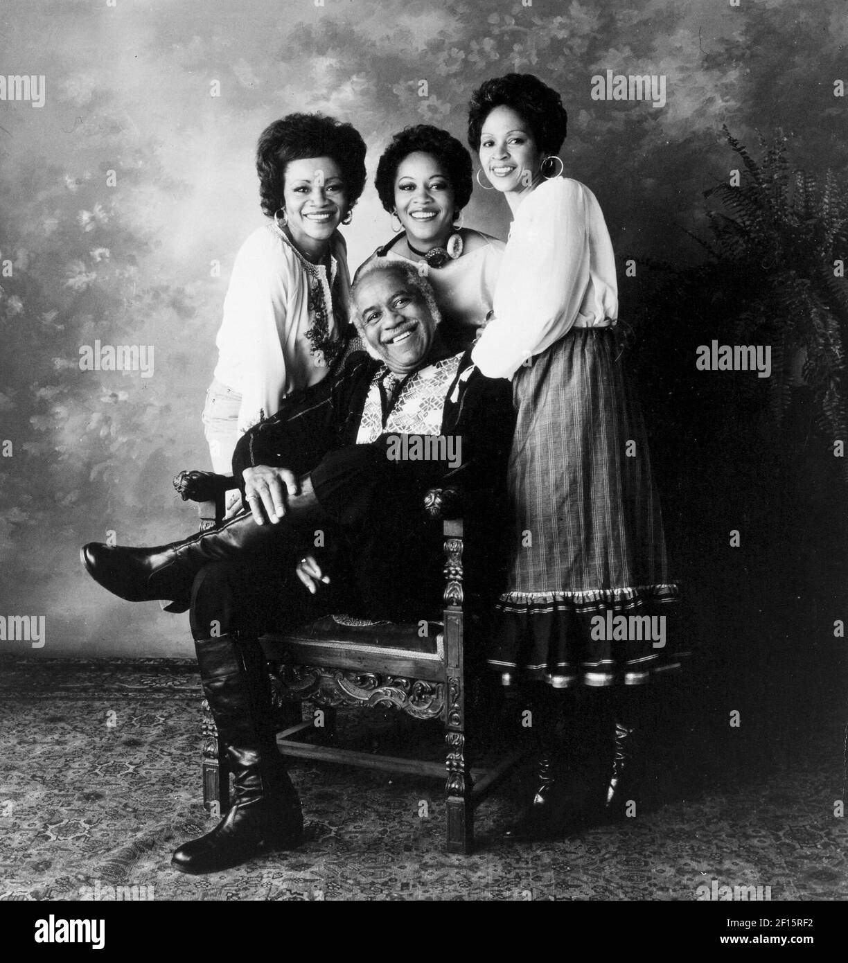 In this 1996 file photograph, Pops Staples, center, is surrounded by ...