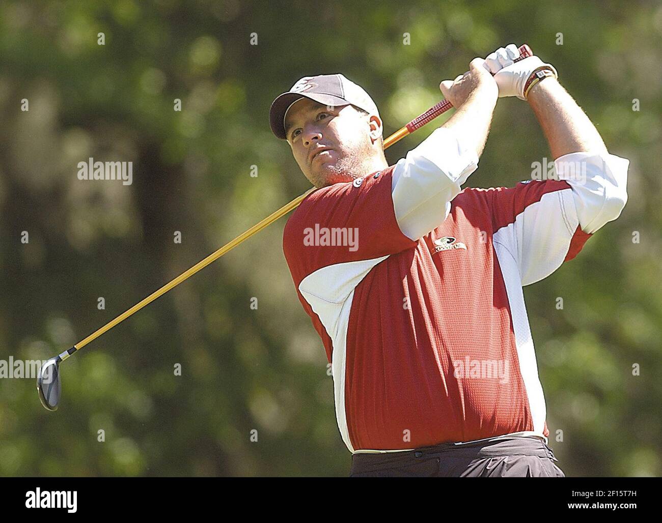 Boo Weekley watches his tee shot from the 13th hole at Harbour Town ...