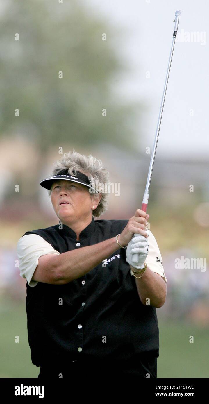 Laura Davies watches her approach shot into the green on the eighth ...